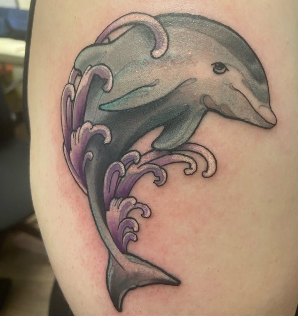 Dolphin Tattoos: Where Ink Meets Spirit, Play, and Freedom - Cleo Diva